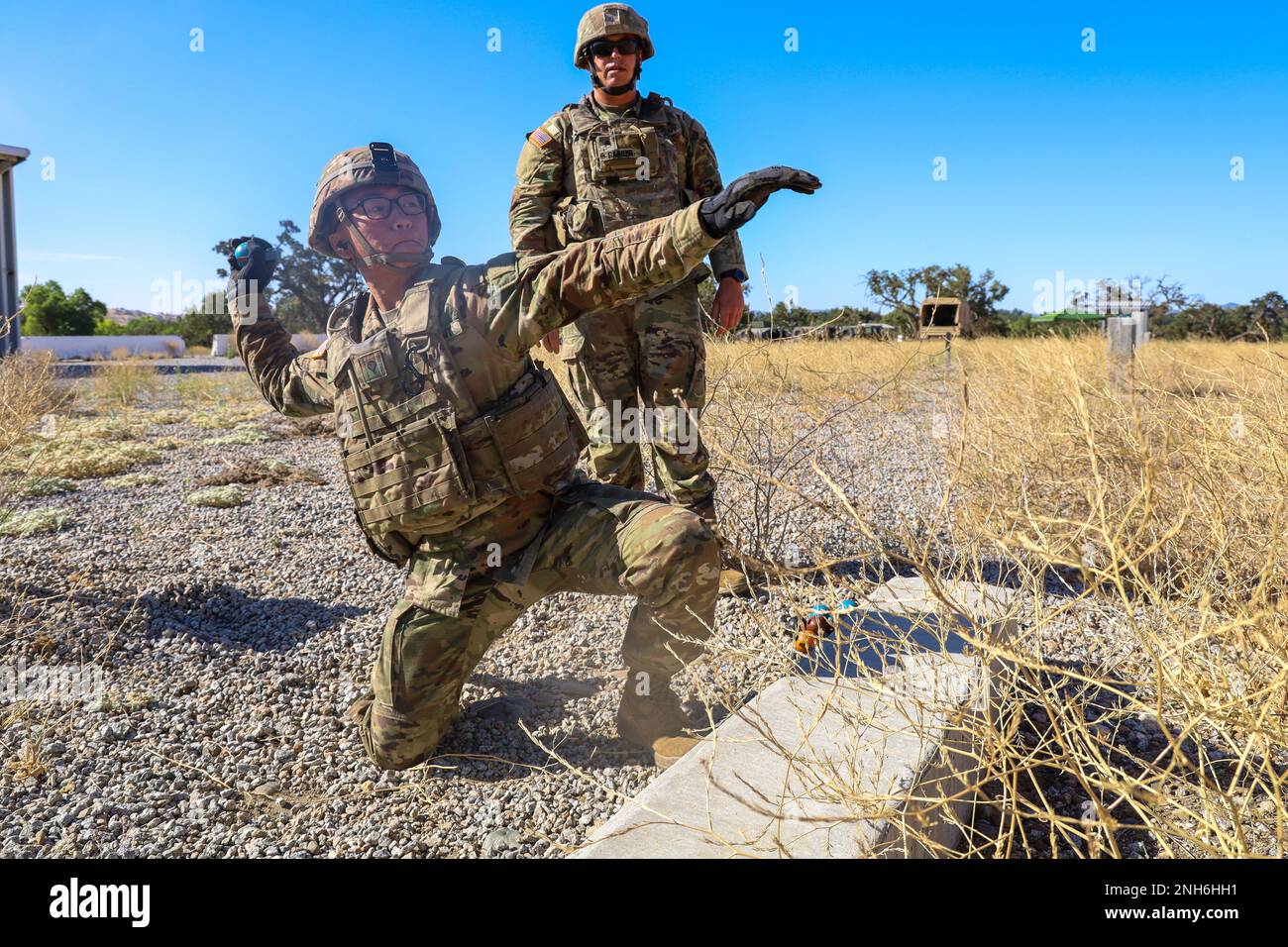 Sergeant Elisha Mueller and Specialist Aaron Yang of the 149th Chemical ...