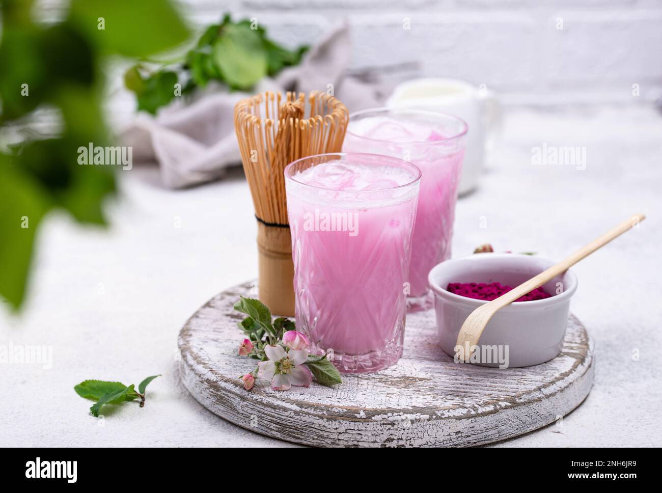 Pink matcha ice latte with milk Stock Photo - Alamy