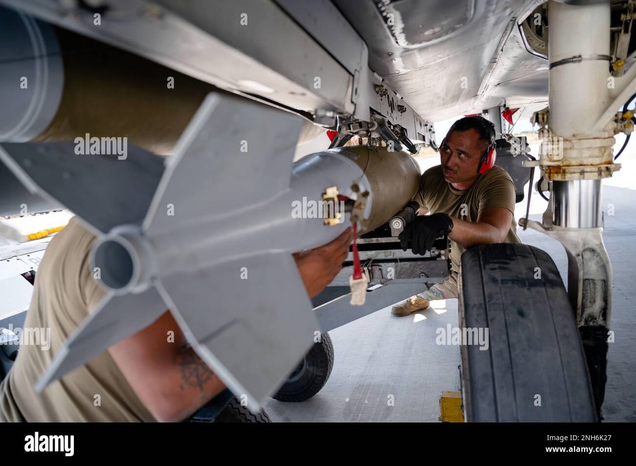 U.S. Air Force Staff Sgt. Nicholas Danley, a weapons load crew team ...