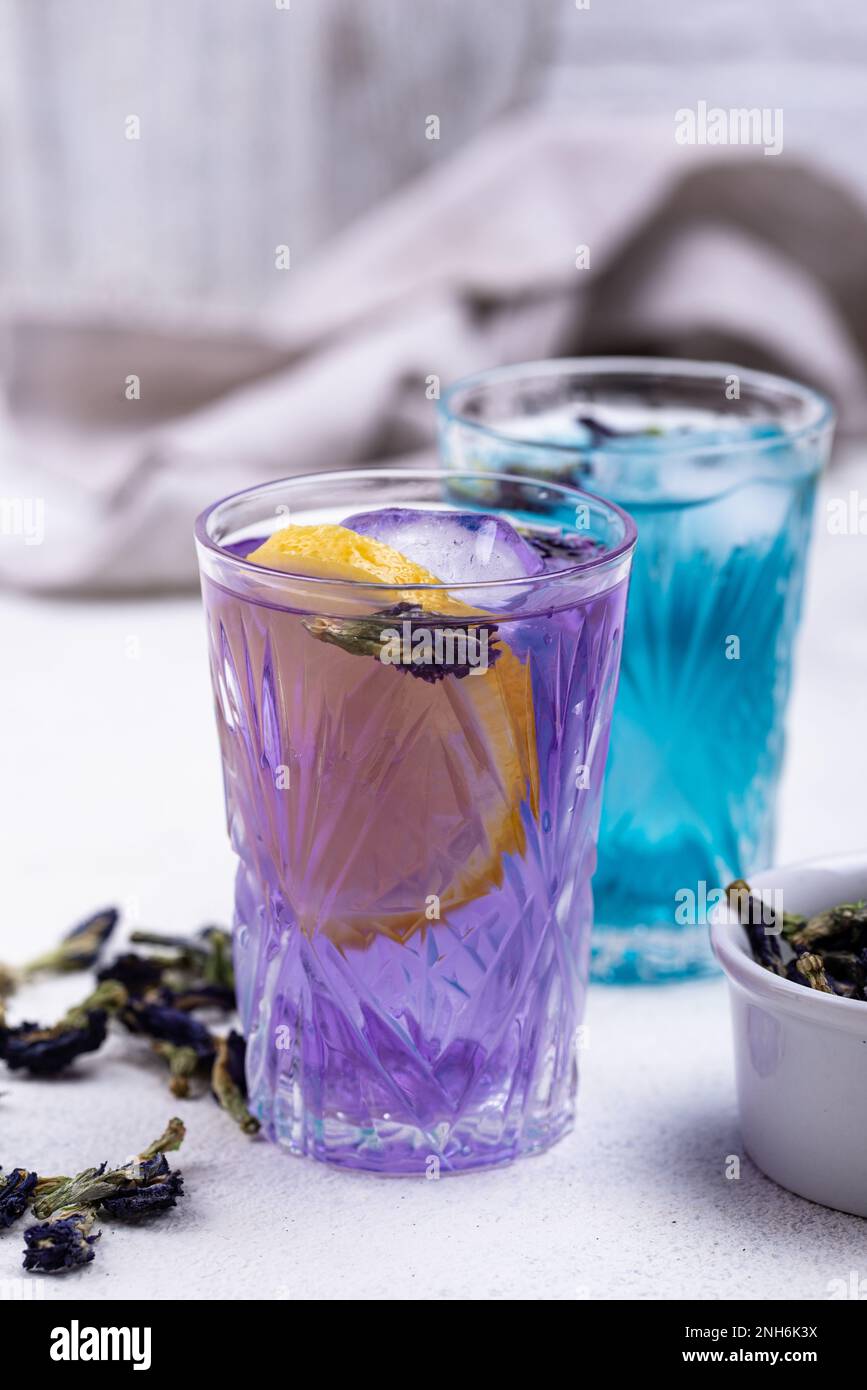 Cold blue and purple tea Butterfly pea Stock Photo - Alamy