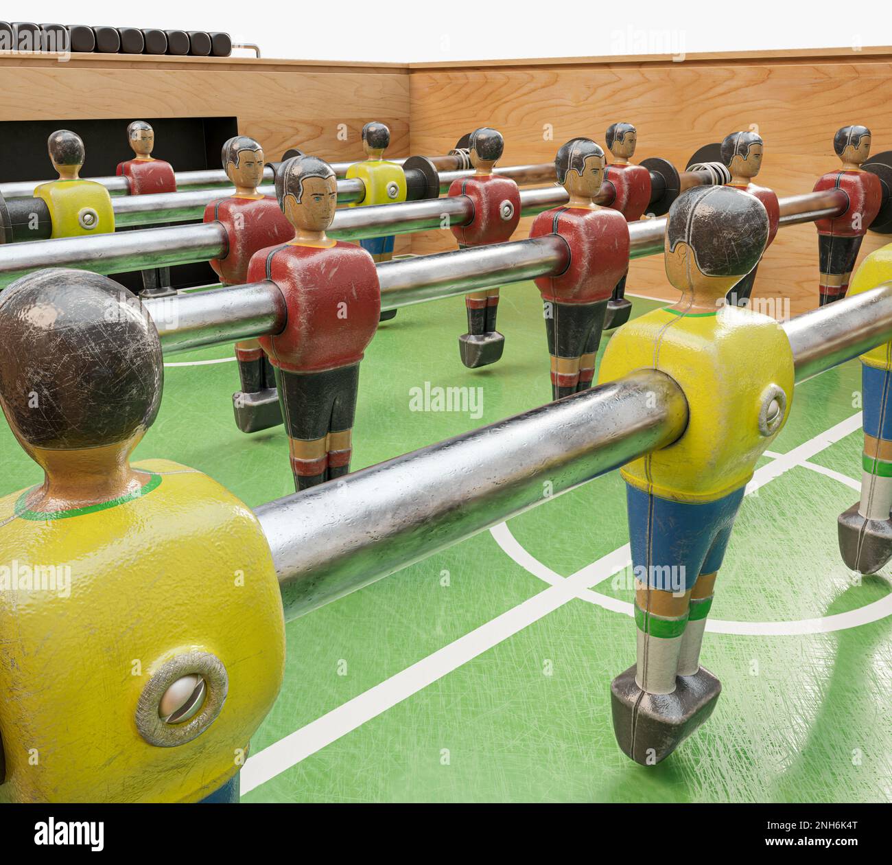 A vintage wooden foosball table with detailed metal player figurines in ...