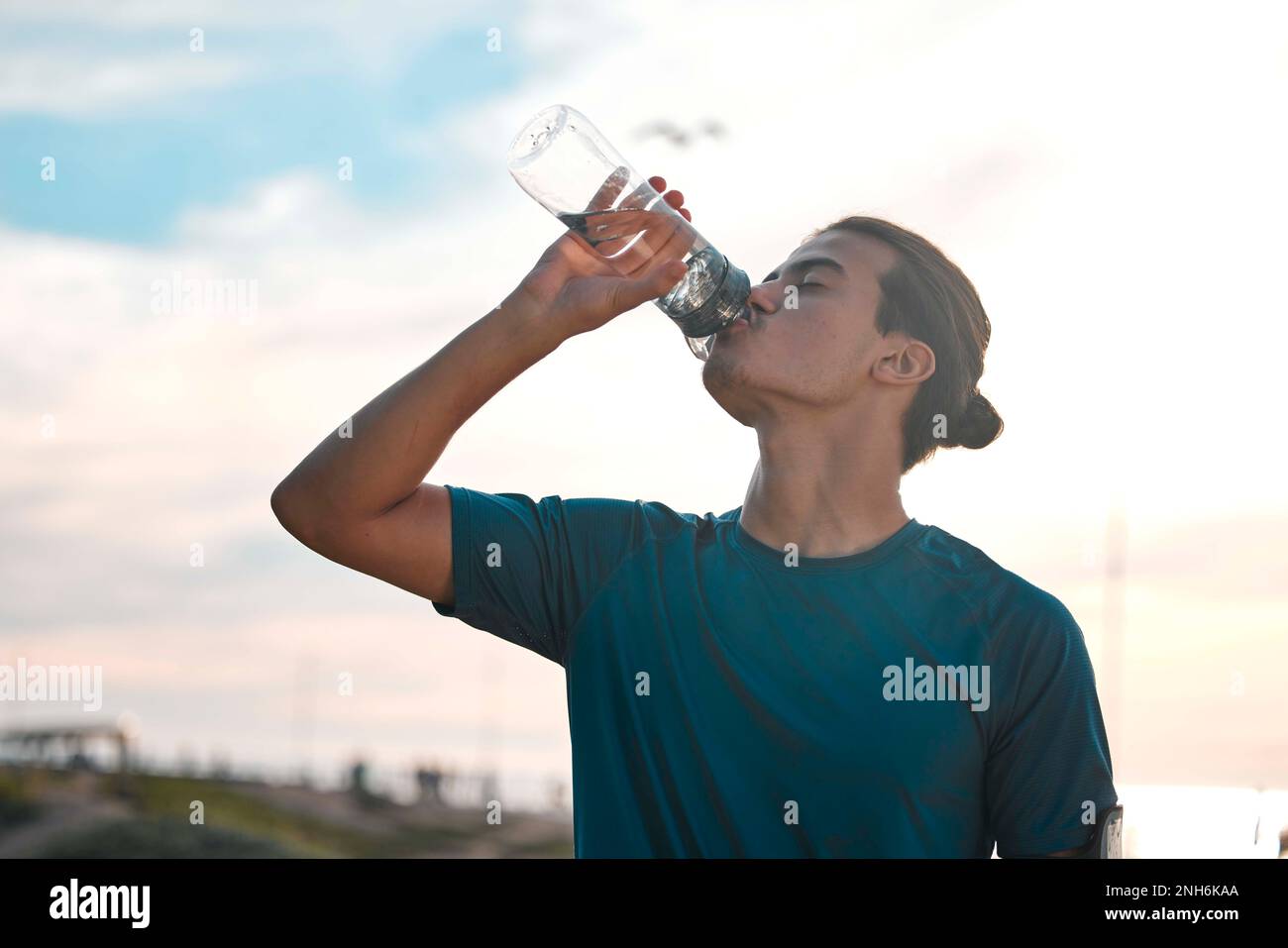 Fitness, exercise and man drinking water for wellness, healthy ...