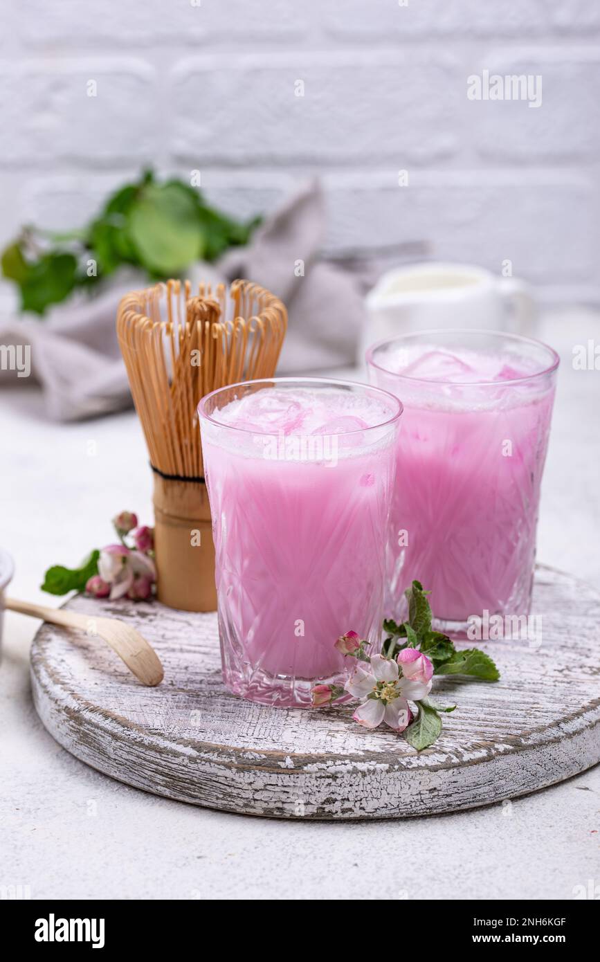 Pink matcha ice latte with milk Stock Photo - Alamy