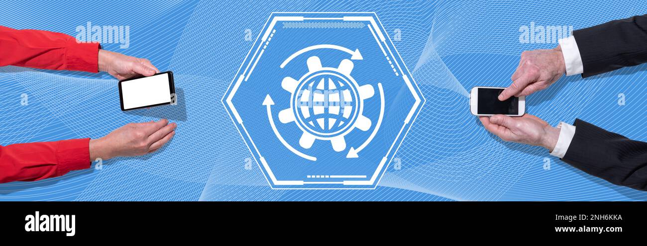 Top view of hands using mobile phone with symbol of globalization ...