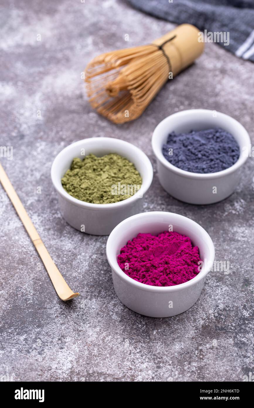 Green, blue and pink matcha powder Stock Photo - Alamy