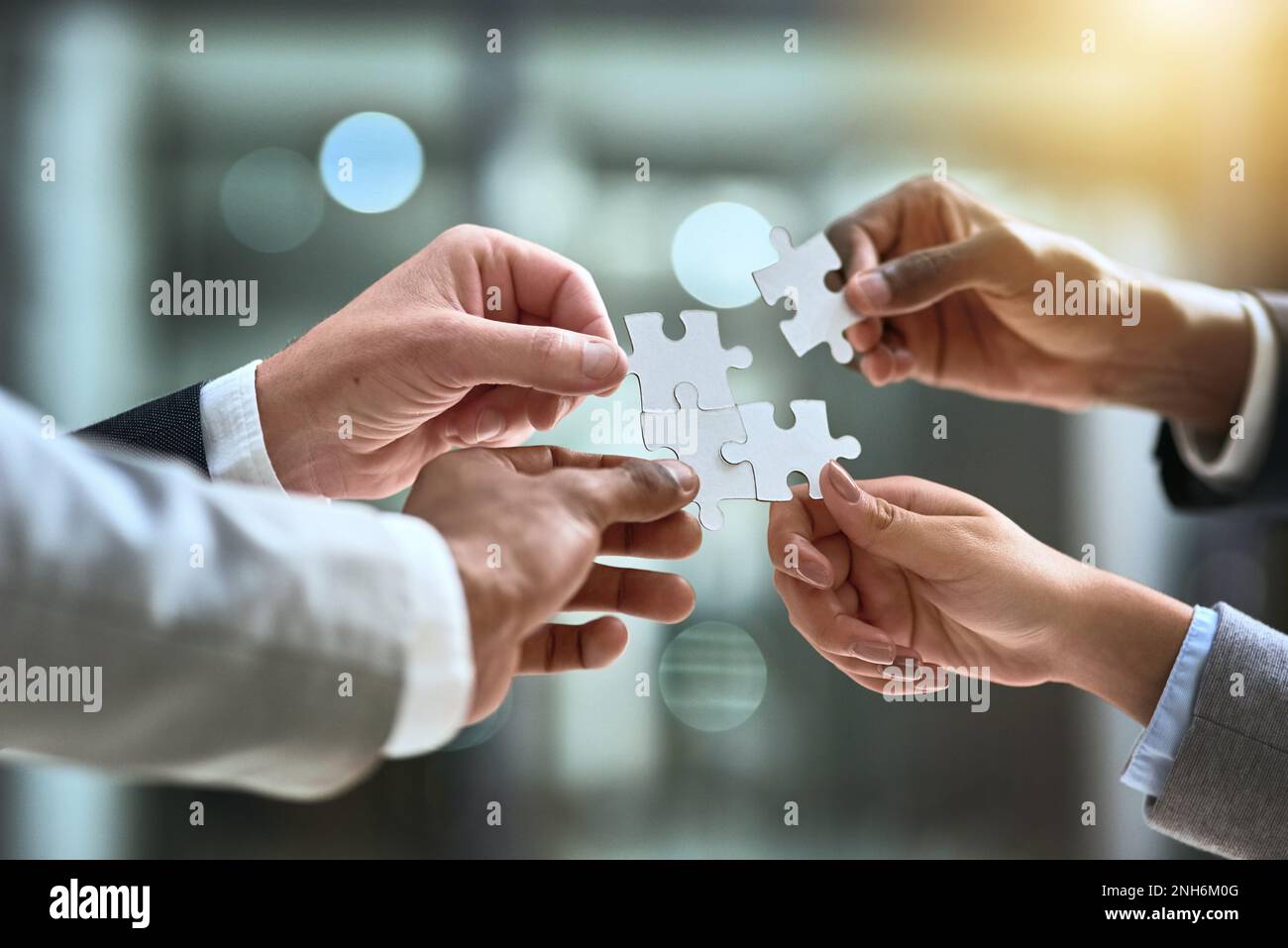 Teamwork, a sure solution to a business challenge. a group of ...