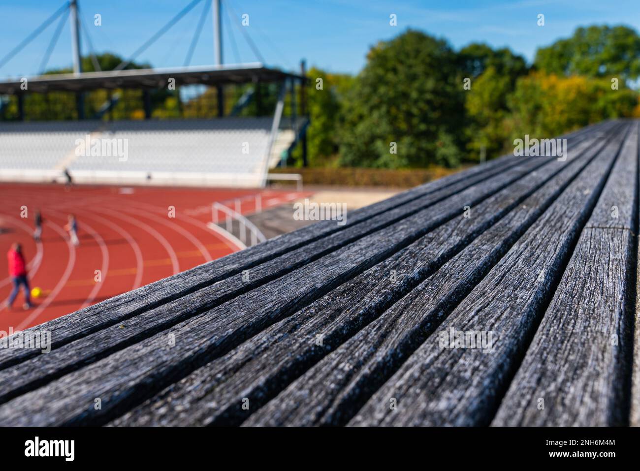Close view of the structure of a wooden bench. Sports stadium out of ...