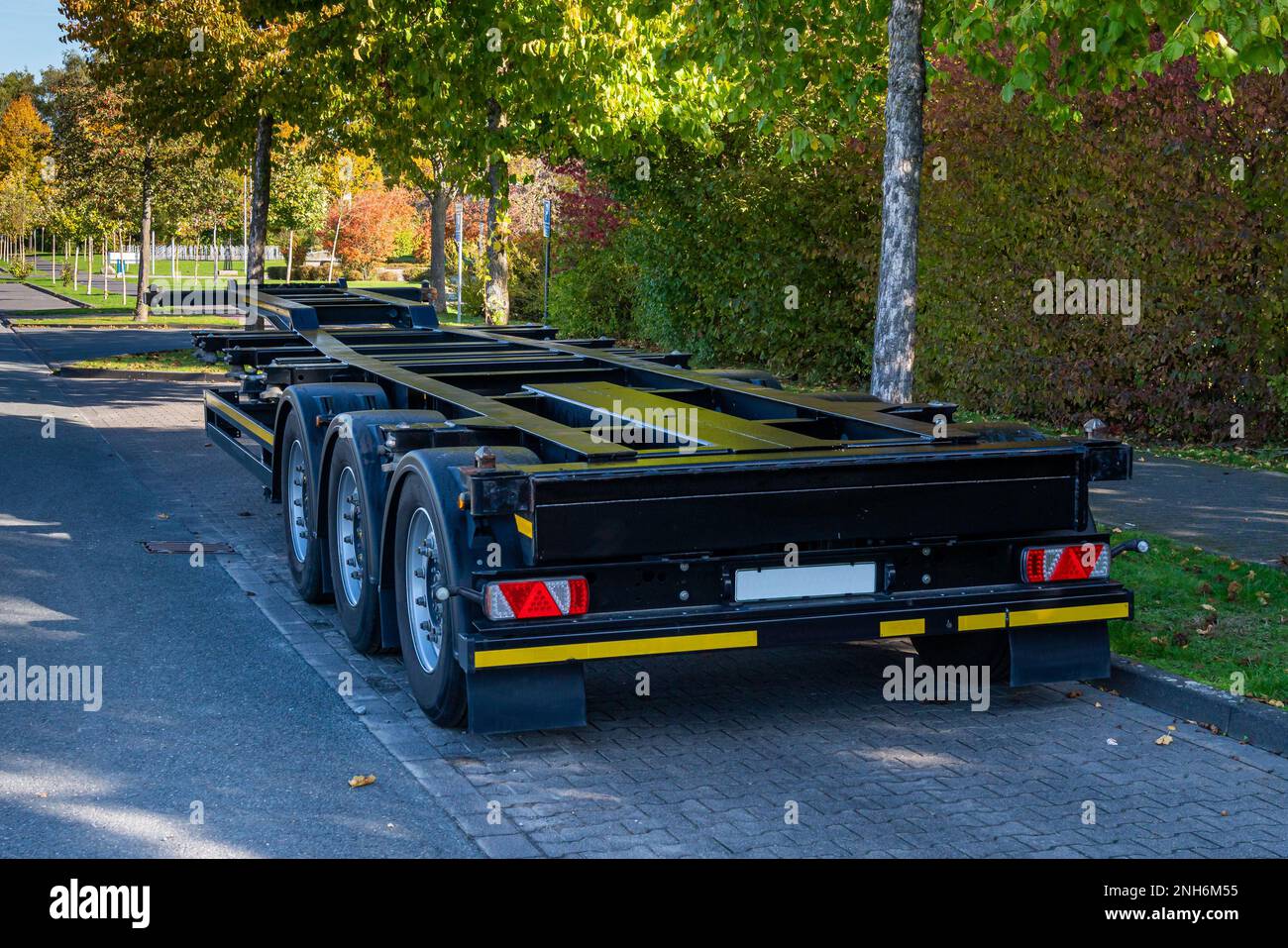 Standing on the side of the trailer platform truck. Back view Stock ...