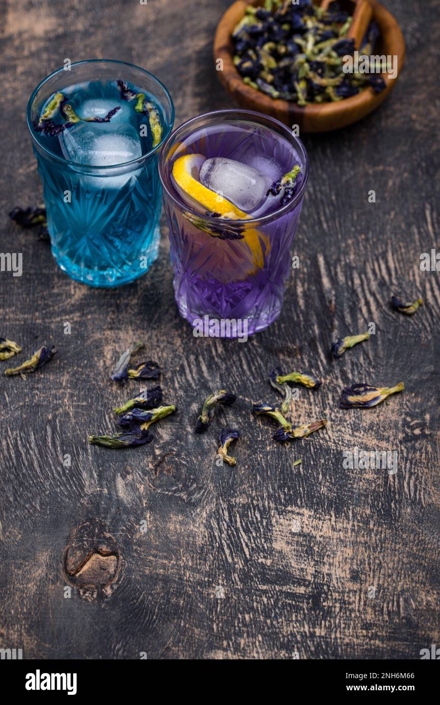 Cold blue and purple tea Butterfly pea Stock Photo - Alamy