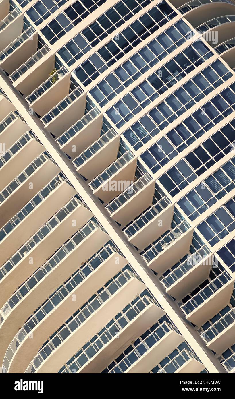 Architectural detail of building facade with glass wall windows and ...