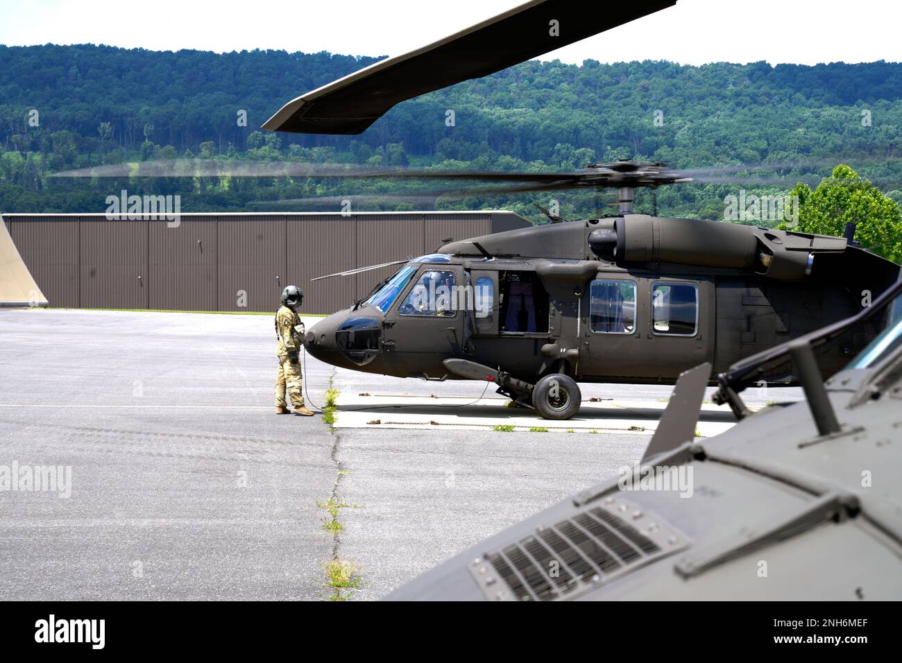 A crew chief assigned to the 28th Expeditionary Combat Aviation Brigade ...