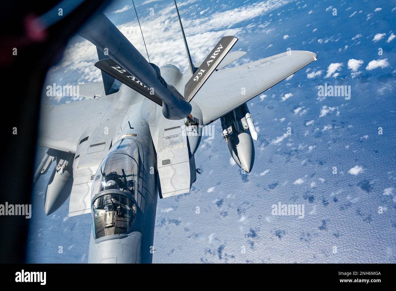 A 67th Fighter Squadron F-15C Eagle receives fuel from a 909th Air ...