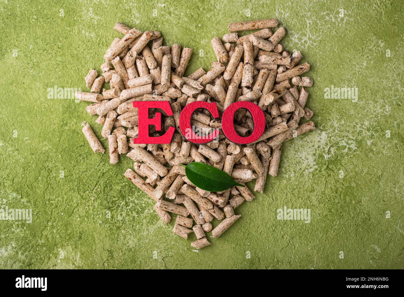 Eco fuel wooden pellets with firewood Stock Photo - Alamy