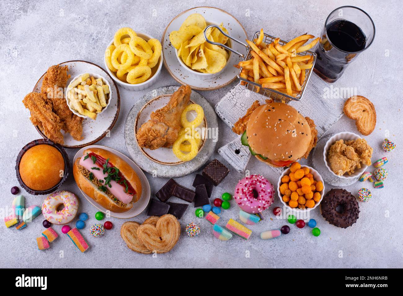 Assortment of various unhealthy junk food Stock Photo - Alamy