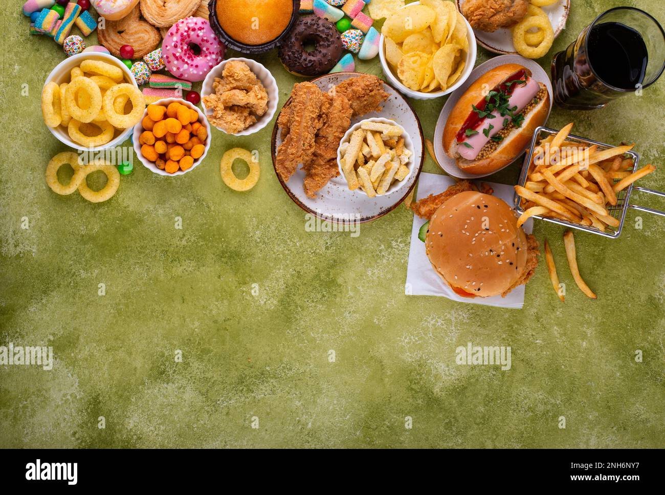 Assortment of various unhealthy junk food Stock Photo - Alamy
