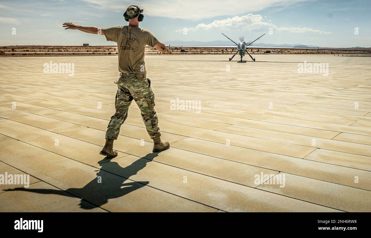 A U.S. Airman with the 163rd Attack Wing, California Air National Guard ...