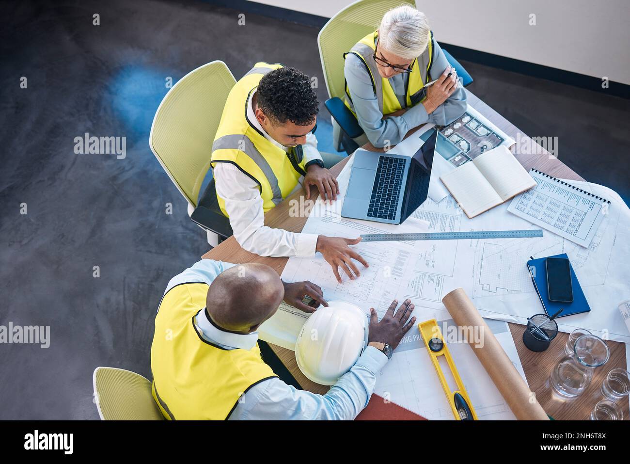 Architect, laptop and team in meeting above for construction or ...