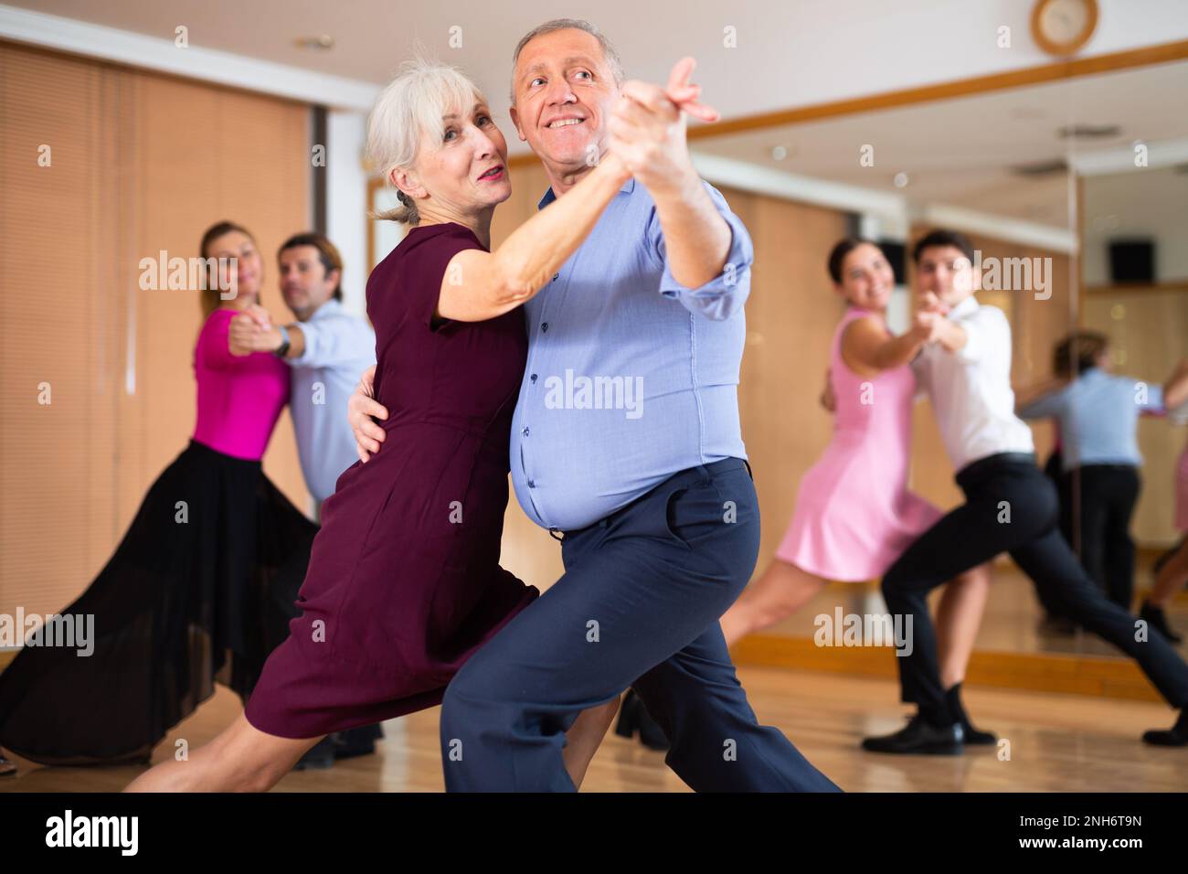 mature women with partner dance Tango Stock Photo - Alamy