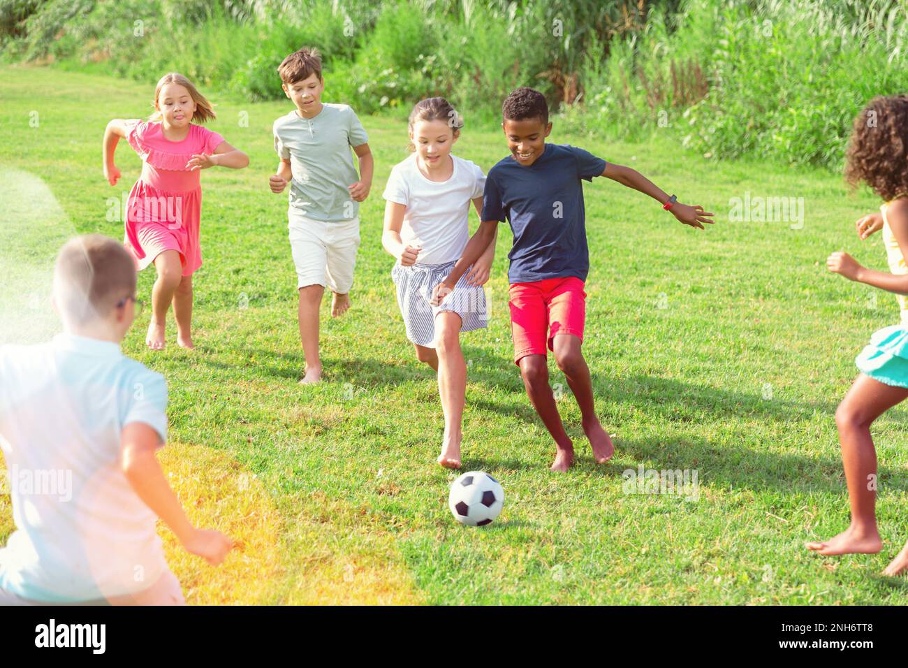 Group cheerful tweens running hi-res stock photography and images - Alamy