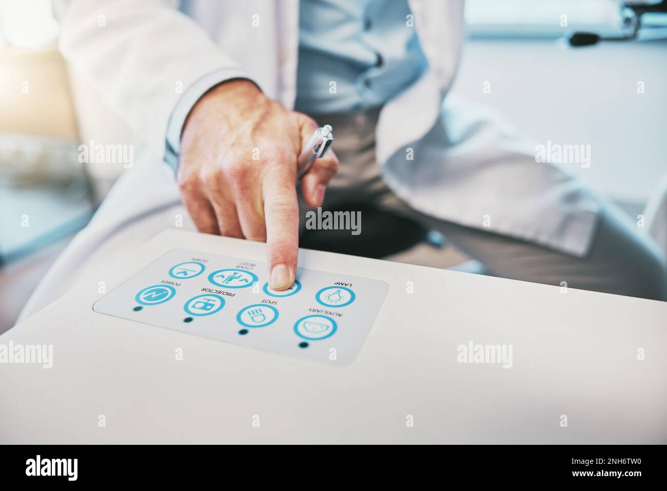 Ophthalmology, hand and doctor working a machine for surgery ...