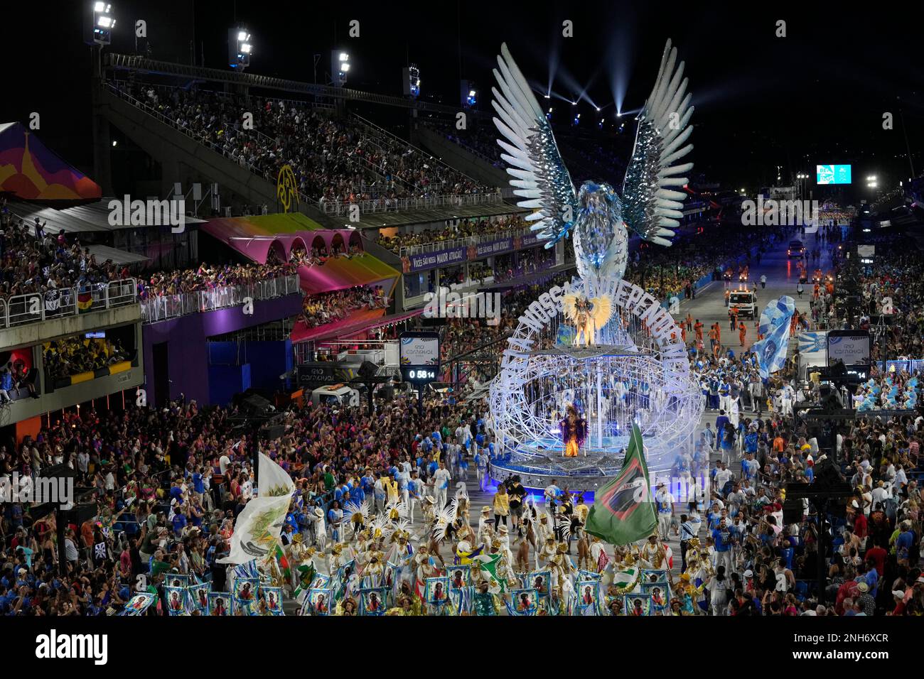 Performers from the Beija Flor samba school parade on a float during ...