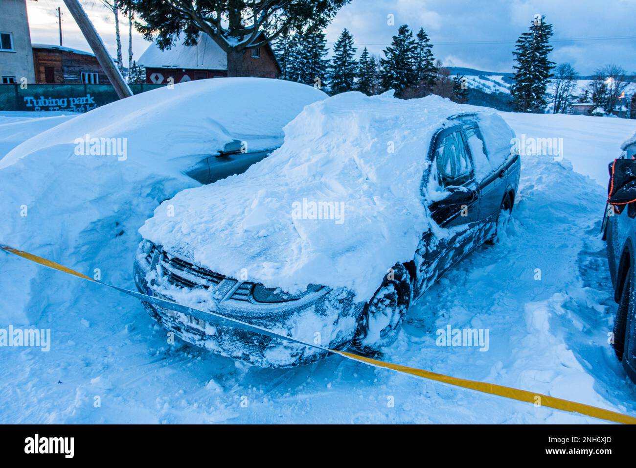 snow covered cars, dug out car Saab 95, parking lot, snowdrift, winter ...