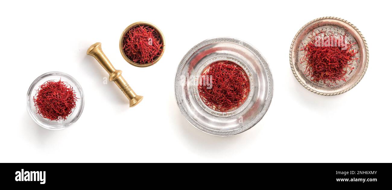 High-Quality Saffron isolated in 4 different containers: silver, brass ...
