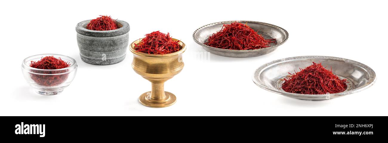 High-Quality Saffron, isolated in 5 different containers: silver, brass ...