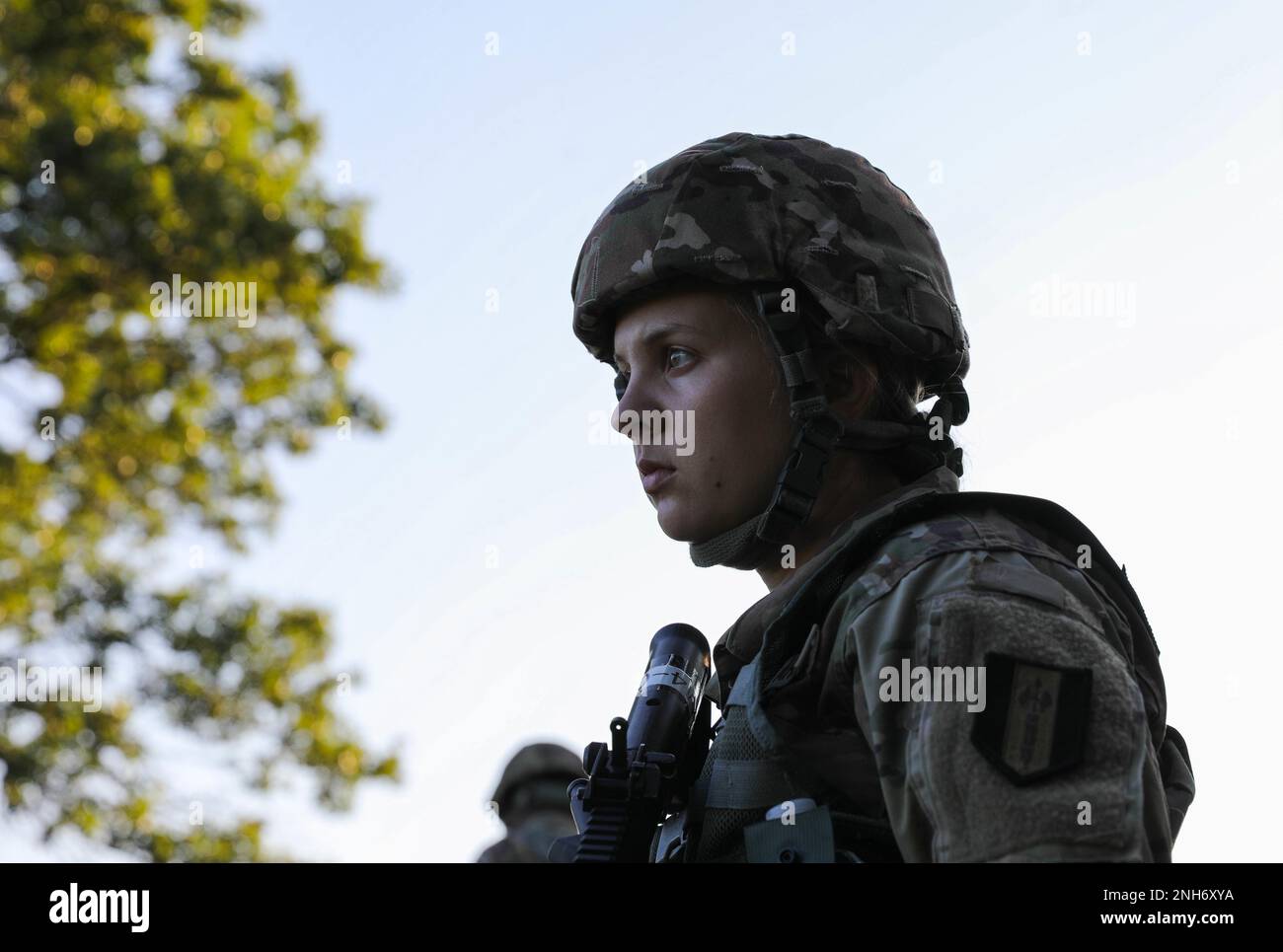 U.S. Army Spc. Julia Hand, assigned to the Headquarters and ...