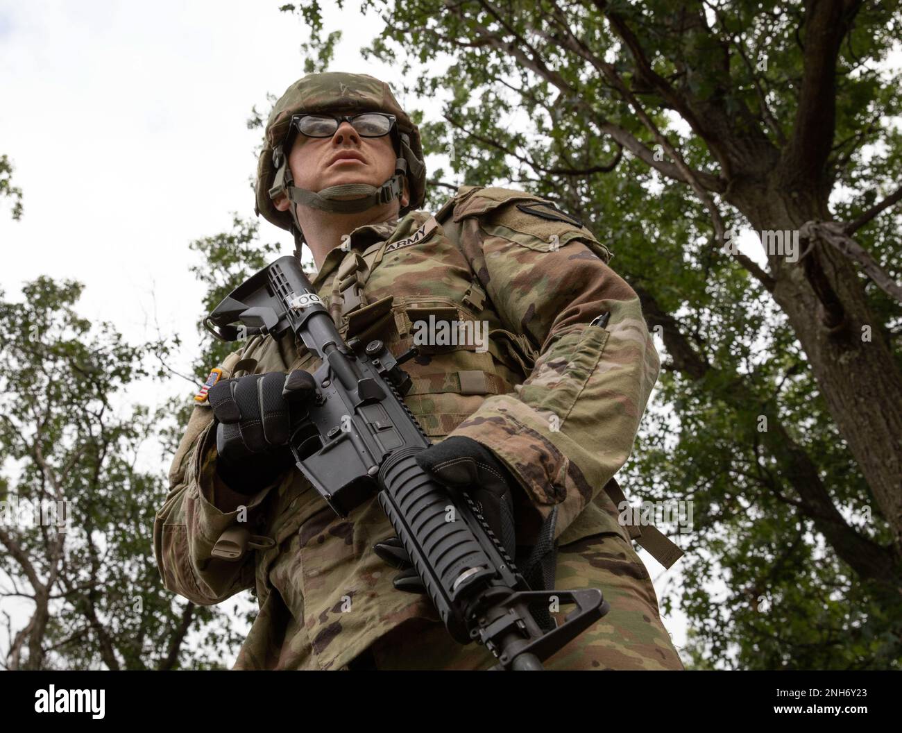 U.S. Army Spc. Robert Curran, a Religious Affairs Specialist assigned ...