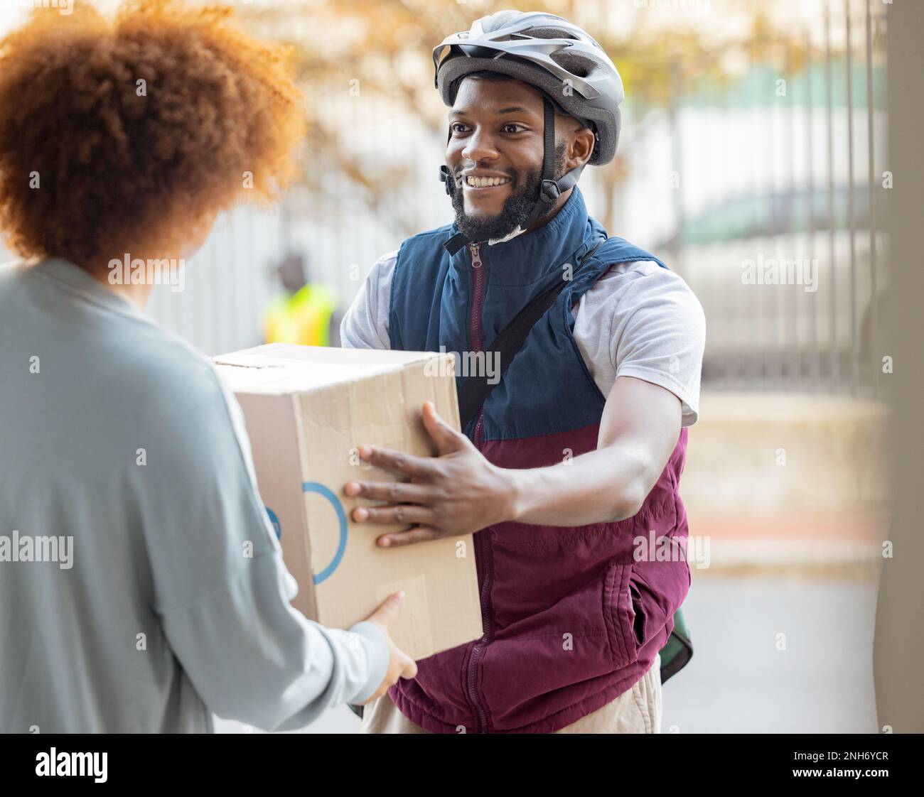 Black man, smile and delivery with box for woman at house for logistics ...