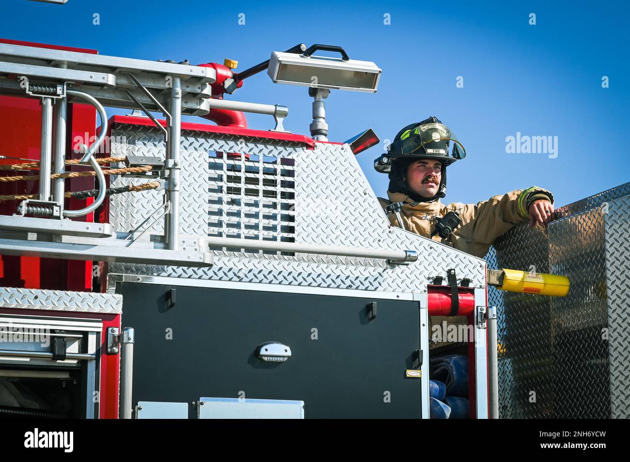Jesse Rood, 155th Air Refueling Wing firefighter, stands at his post ...