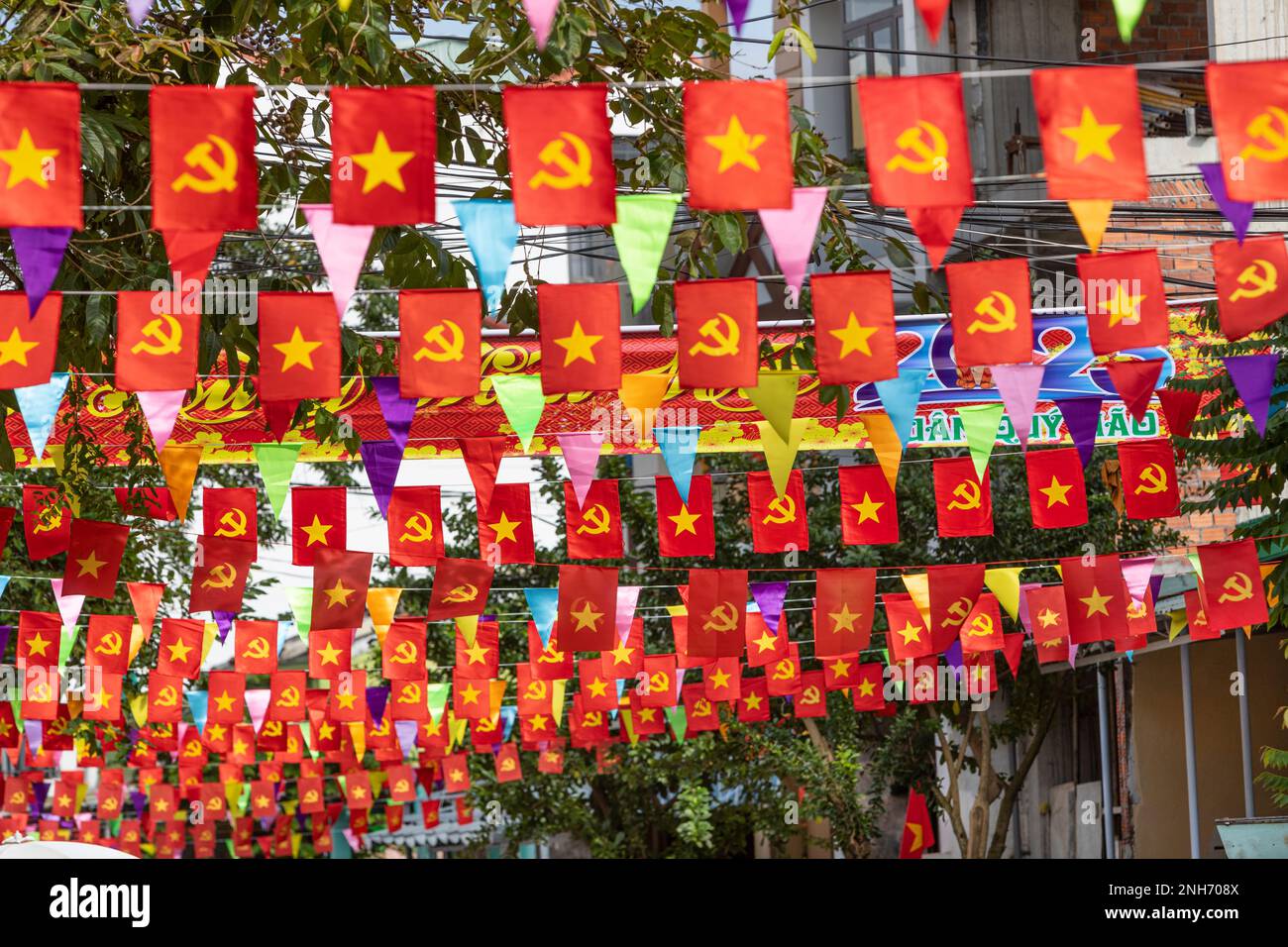 Vietnamese and communist flags decorating for Tet in Hoi An, Vietnam ...