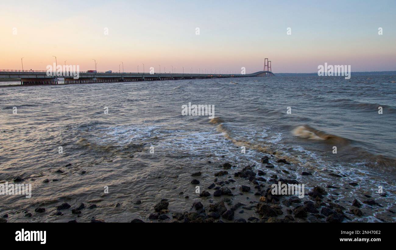 Suramadu Bridge at twilight with colorful sunset in Surabaya, Indonesia ...