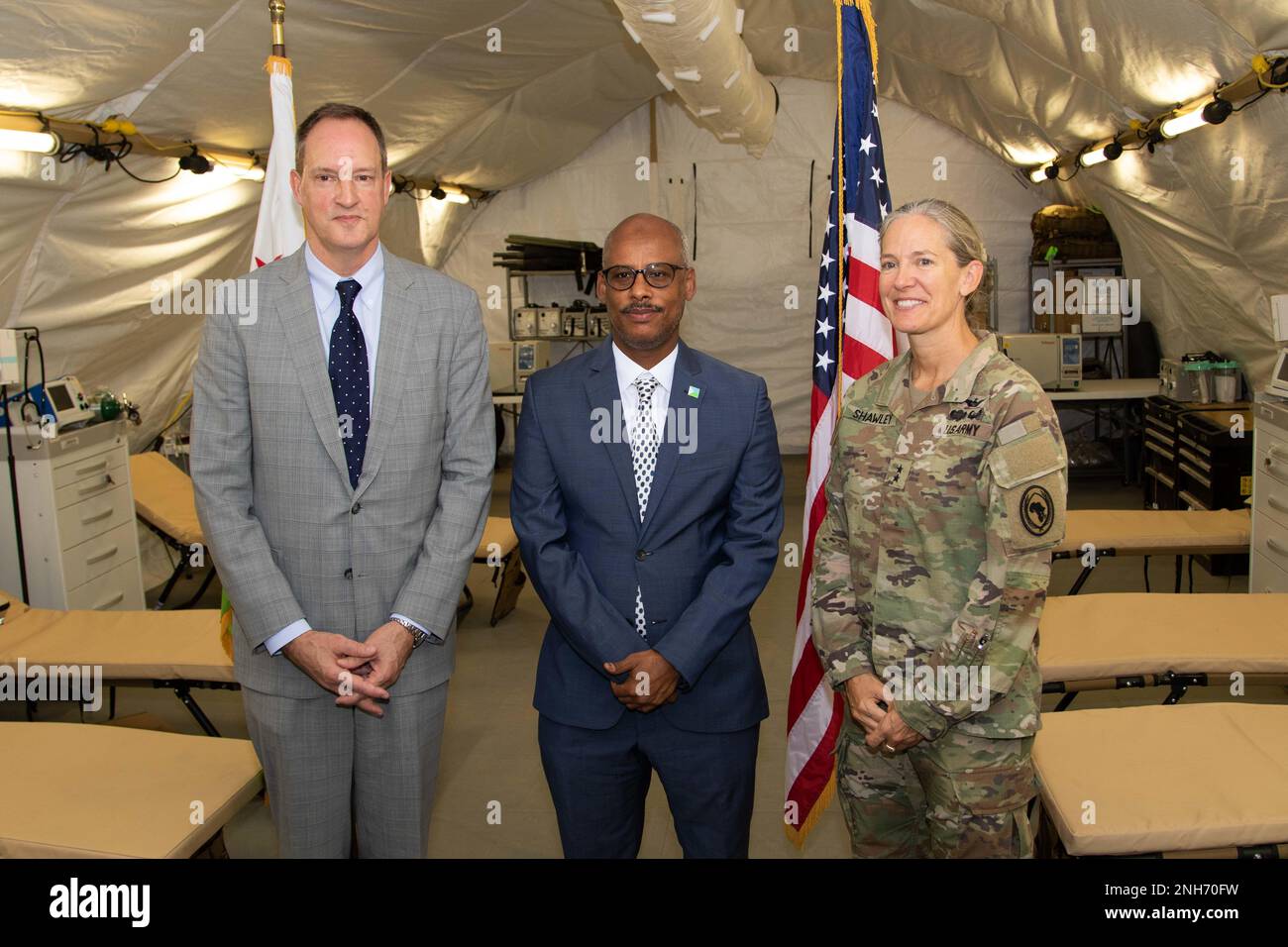 From left to right, the Honorable Mr. Jonathan Pratt, U.S. Ambassador ...