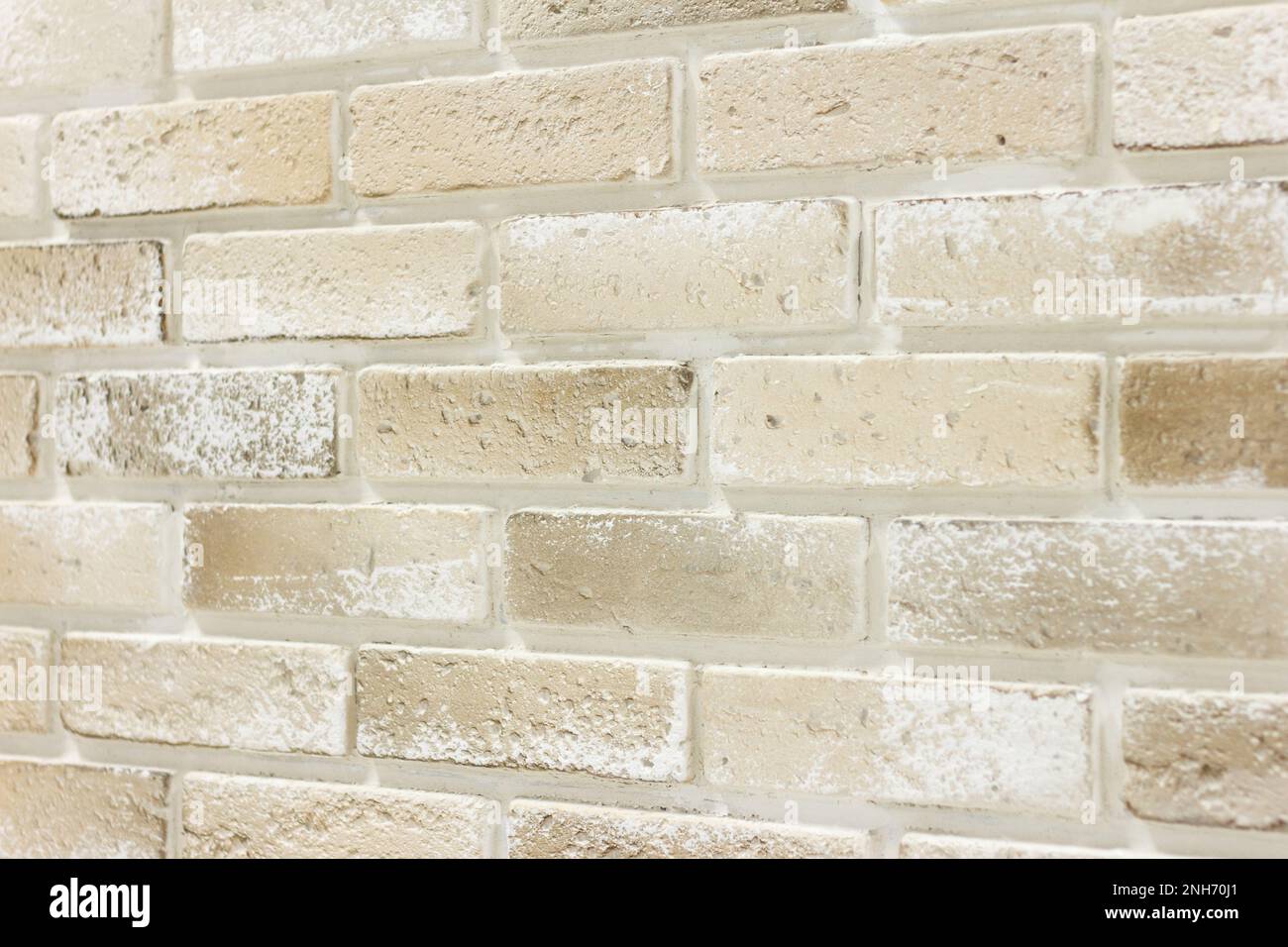 Light brown Ornamental brick wall forms part of interior in house ...