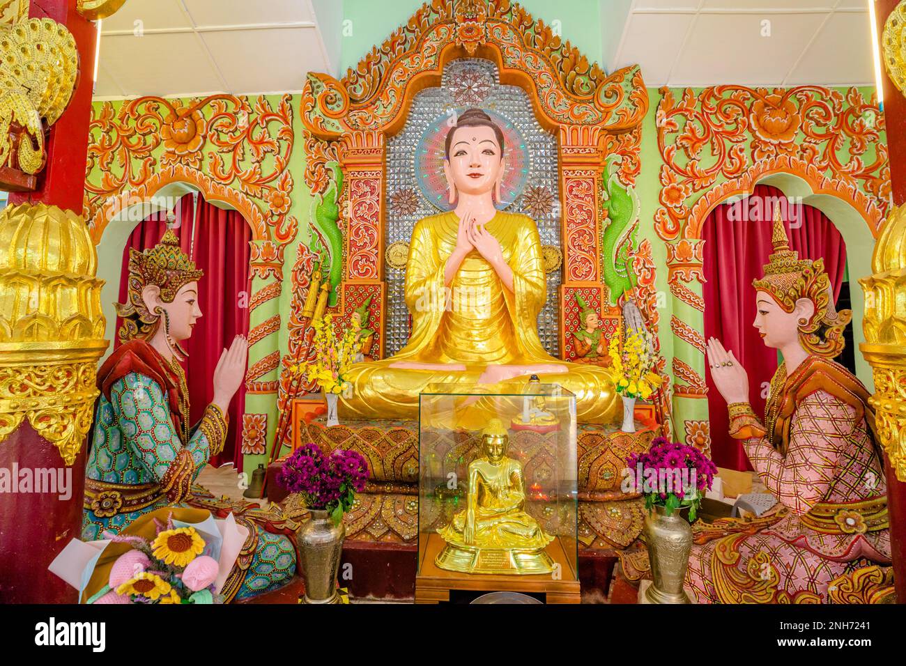 George Town, Penang, Malaysia - Jan 2023: Buddhist statues praying at ...