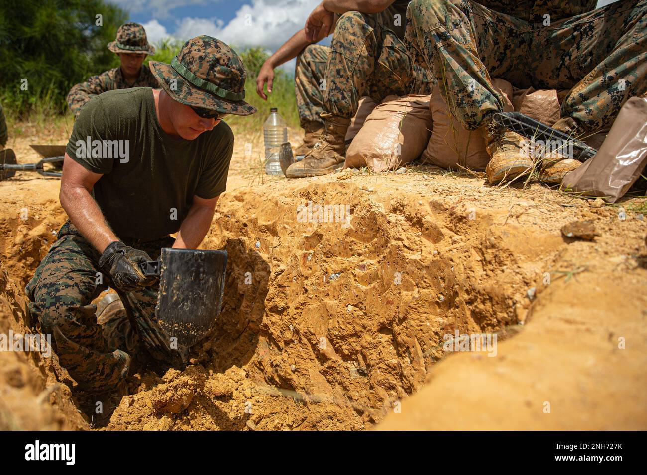 U.S. Marine Corps Lance Cpl. David Shats, an engineer equipment ...