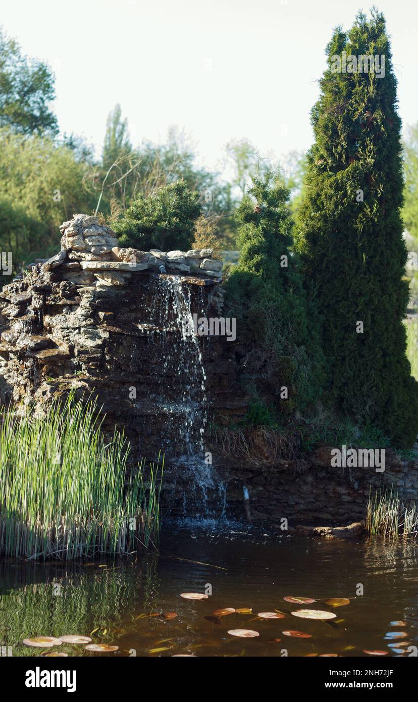 A beautiful simple fountain turning into a waterfall is installed at ...