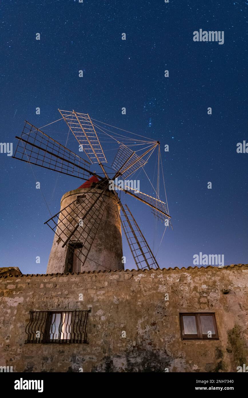Night view of a traditional windmill, salt pans of Trapani Stock Photo ...