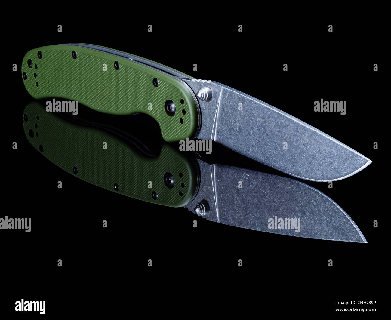 Edc folding knife with stonewash coated blade with reflection isolated ...