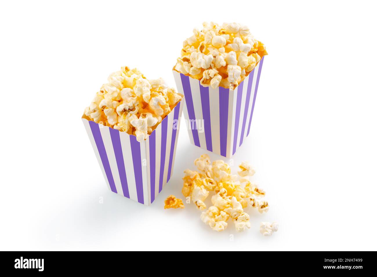 Two purple white striped carton buckets with tasty cheese popcorn ...