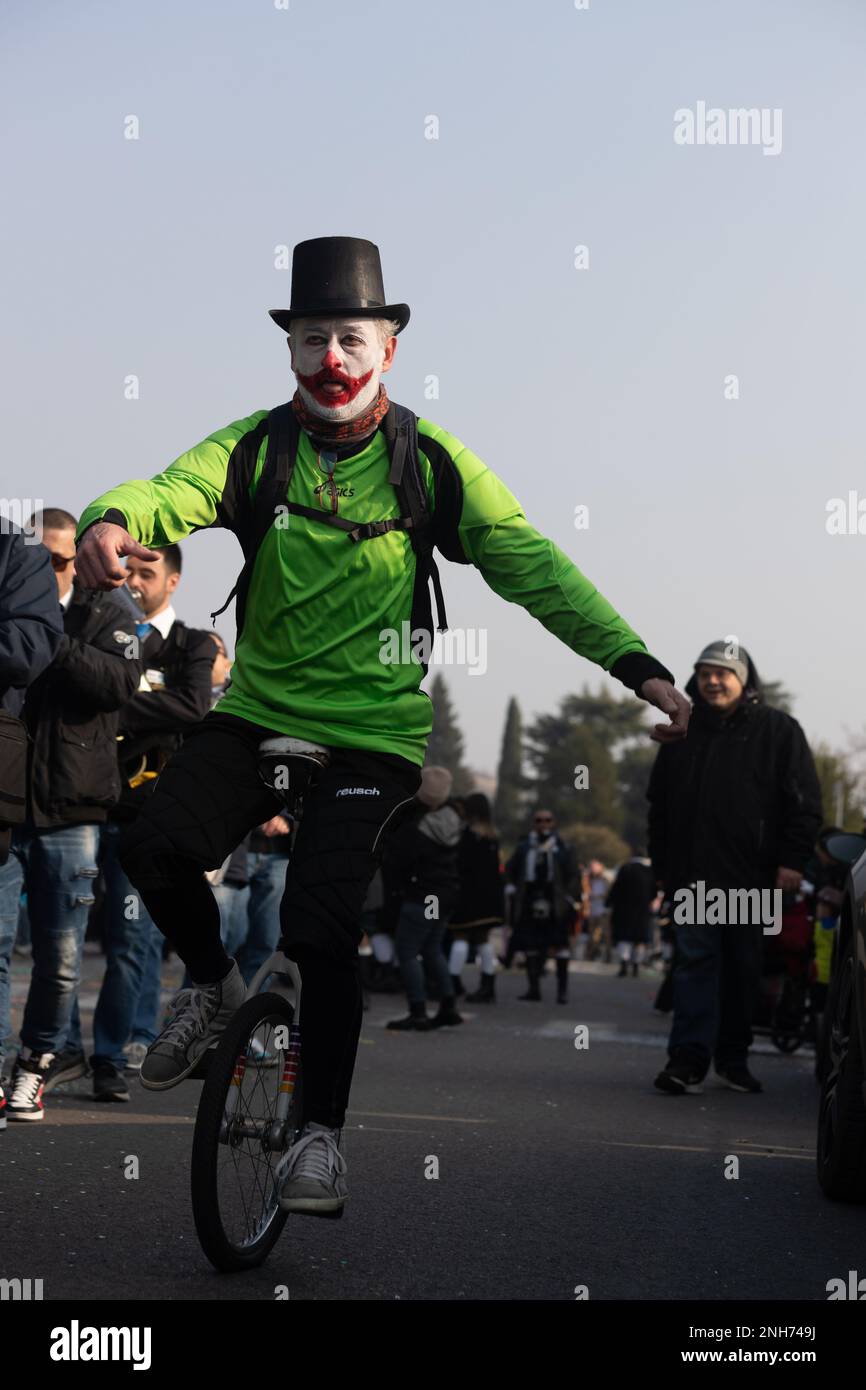 Eccentric Clown Riding Bicycle Stock Photo - Alamy