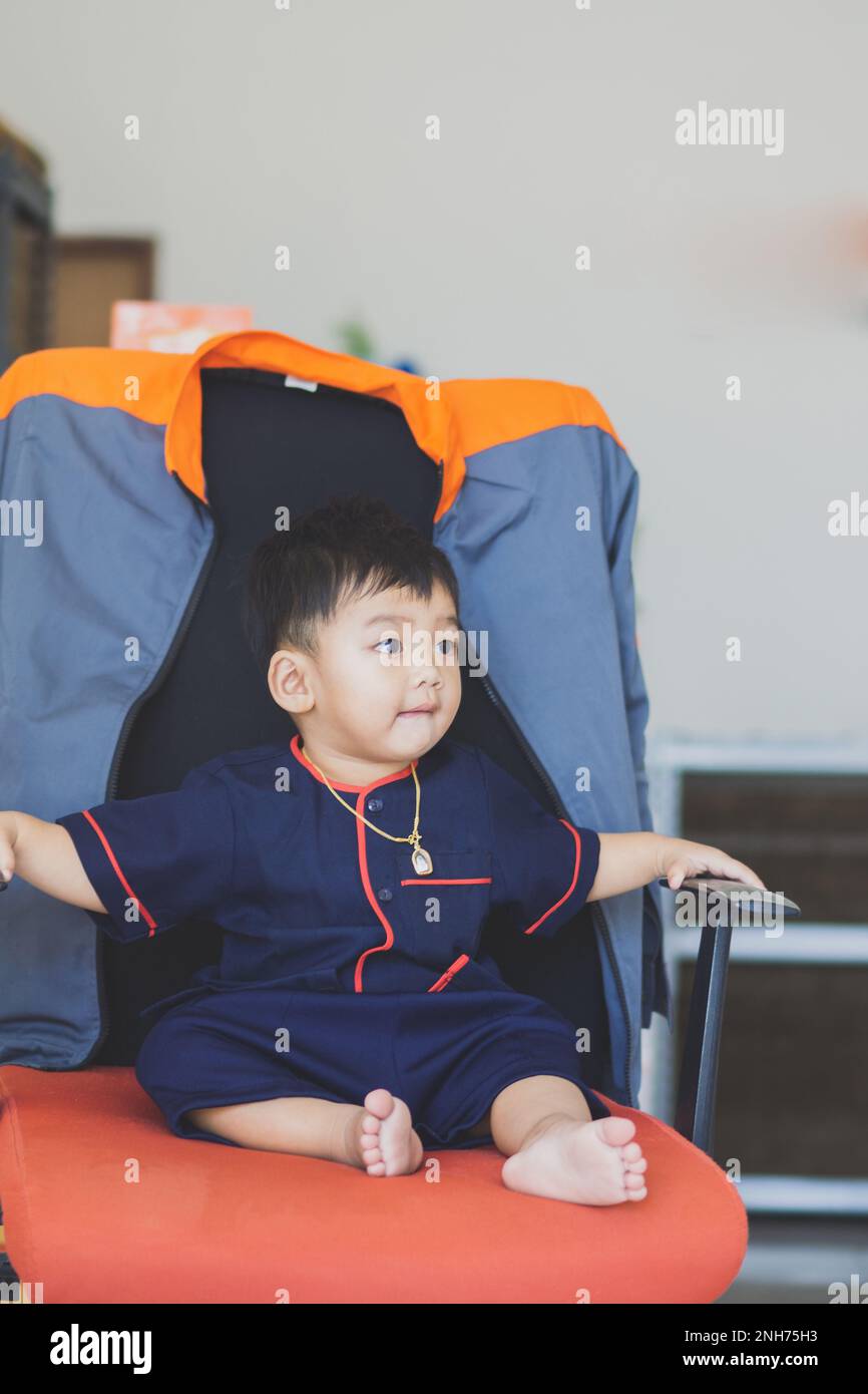 Kid on chest Stock Photo - Alamy