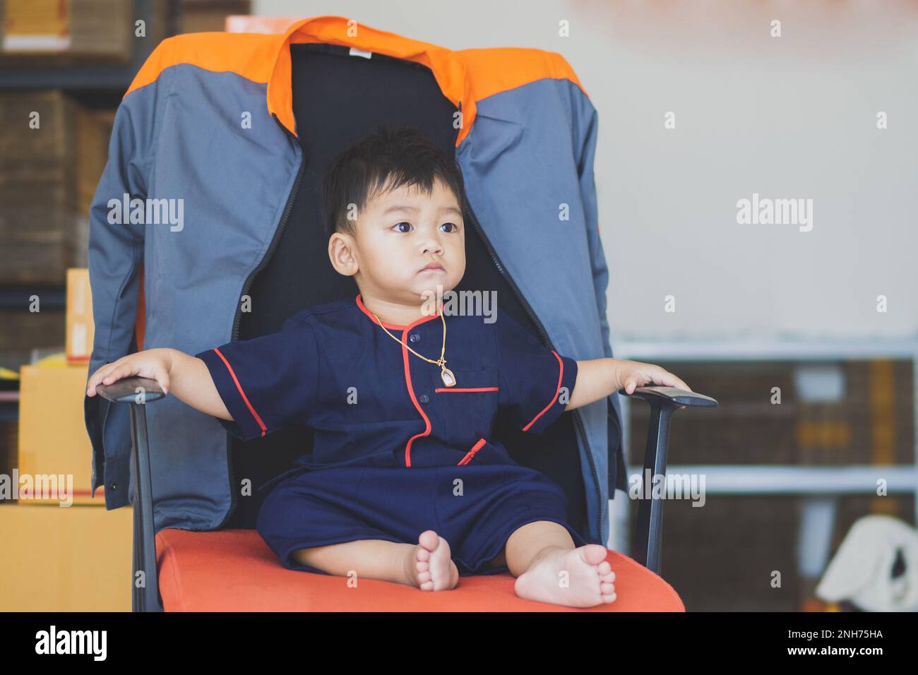Kid on chest Stock Photo - Alamy