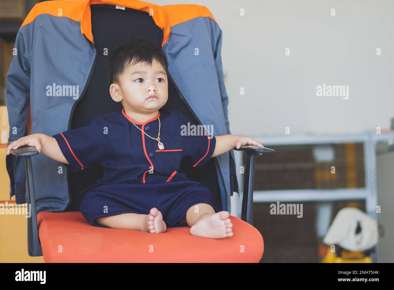 Kid on chest Stock Photo - Alamy