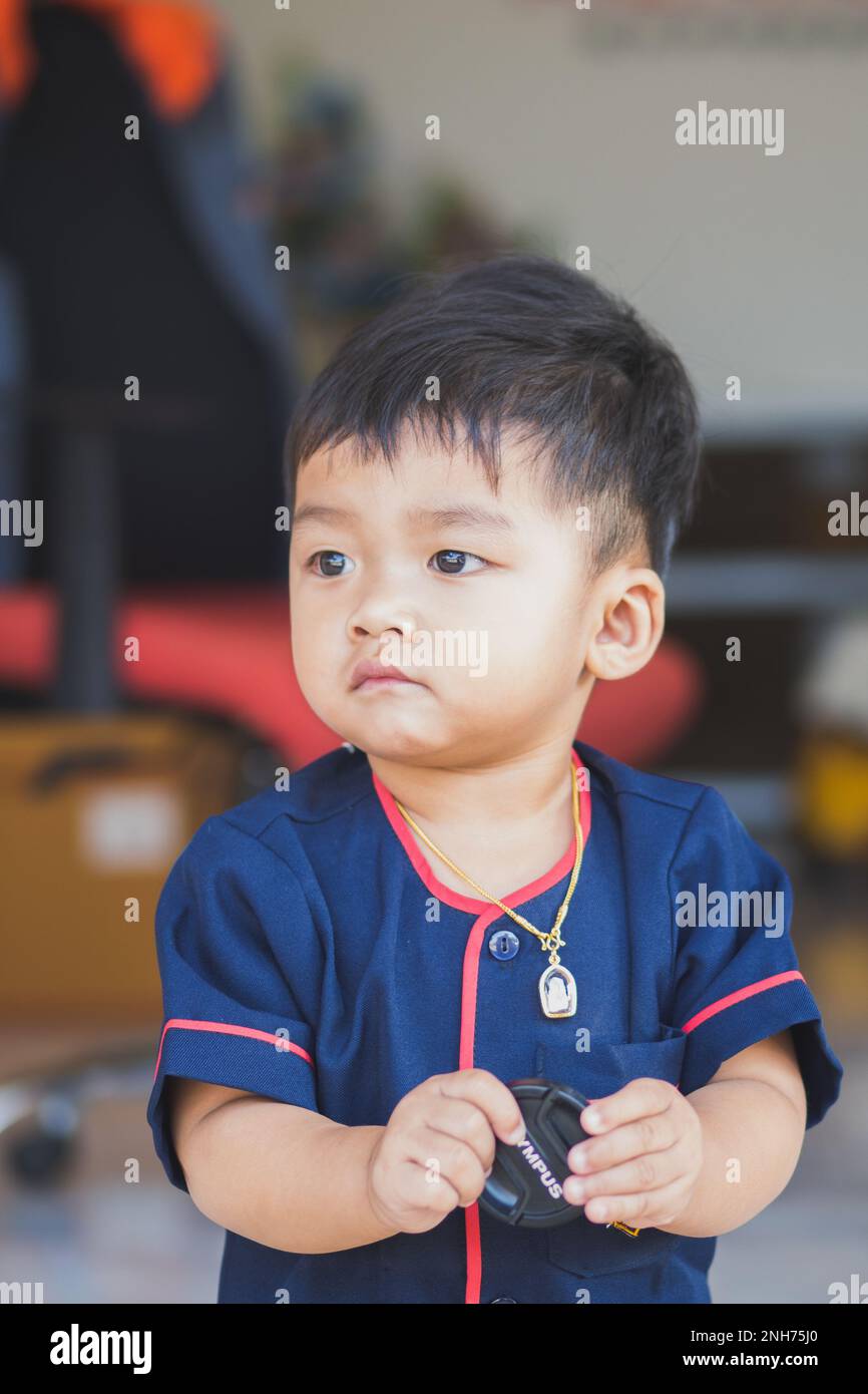 Kid on chest Stock Photo - Alamy