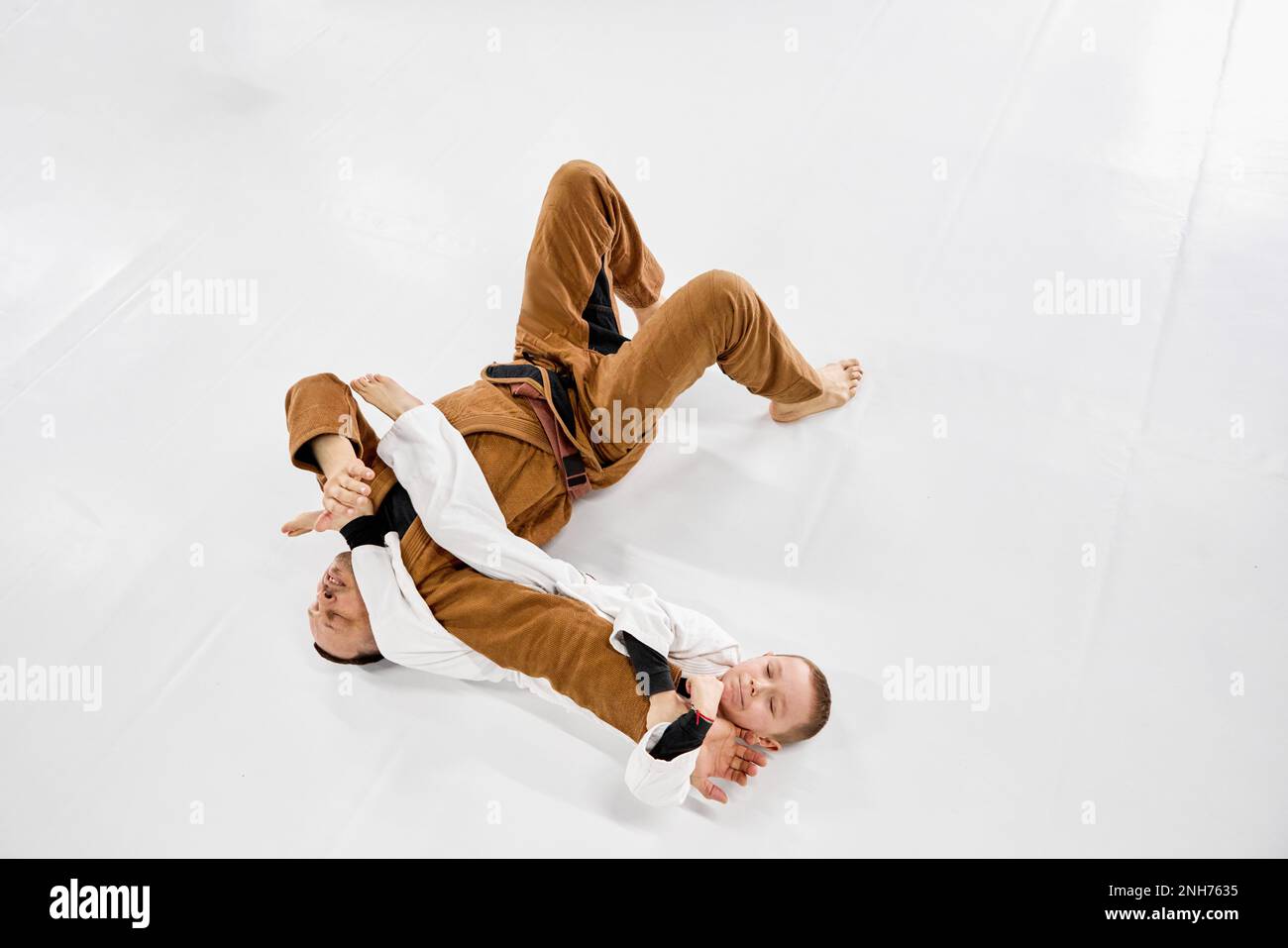 Top view. Dynamic portrait of man, professional judo, jiu-jitsu coach ...