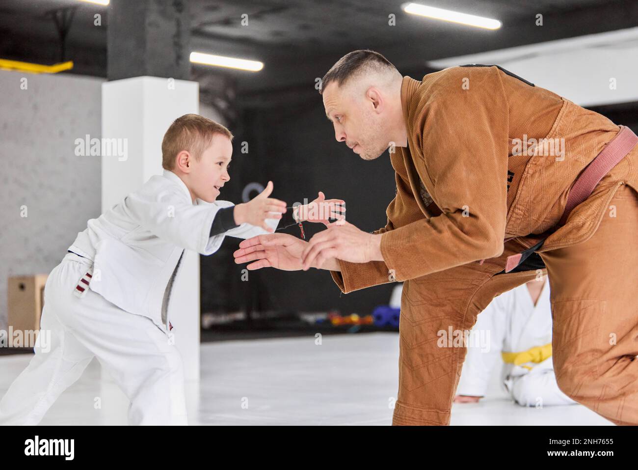 Dynamic portrait of man, professional judo, jiu-jitsu coach training ...