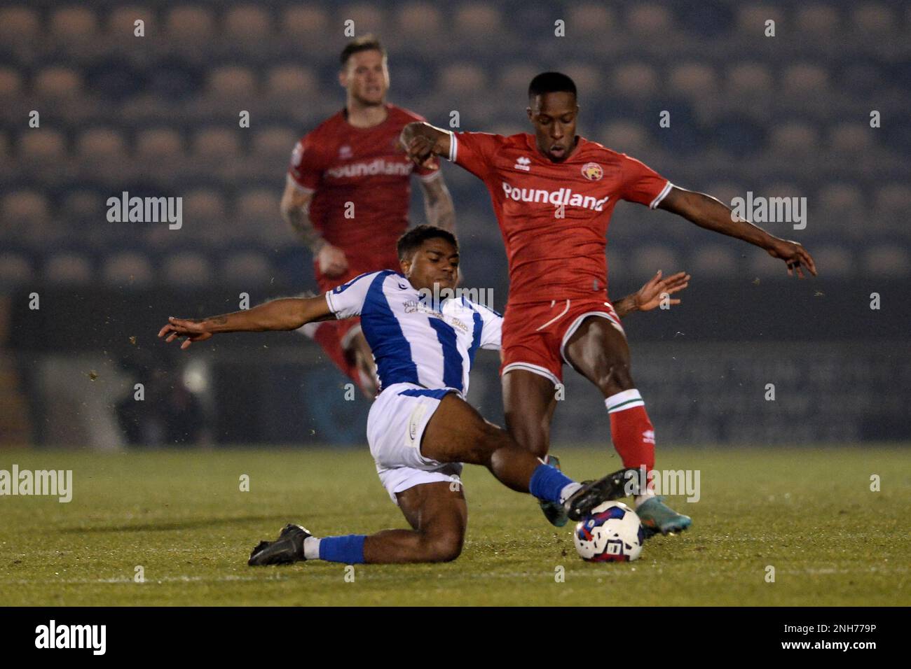 Ossama Ashley of Colchester United does battle with Liam Gordon of ...